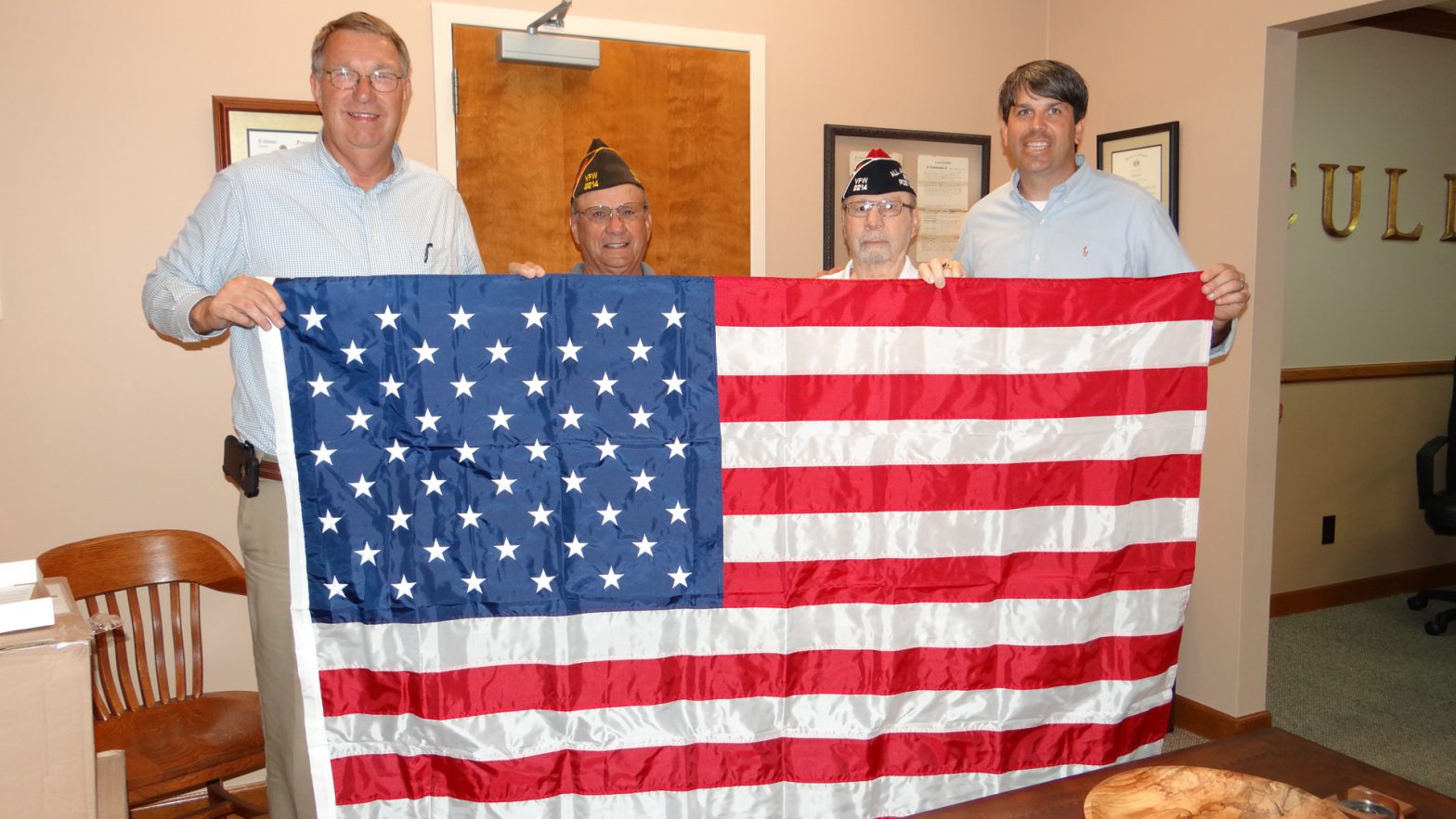 City presents VFW with 50 United States flags - The Cullman Tribune
