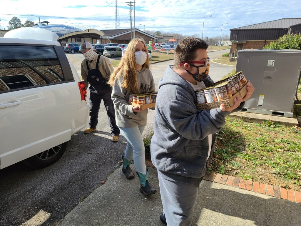 CATA students box up food, love, compassion for families in need - The ...